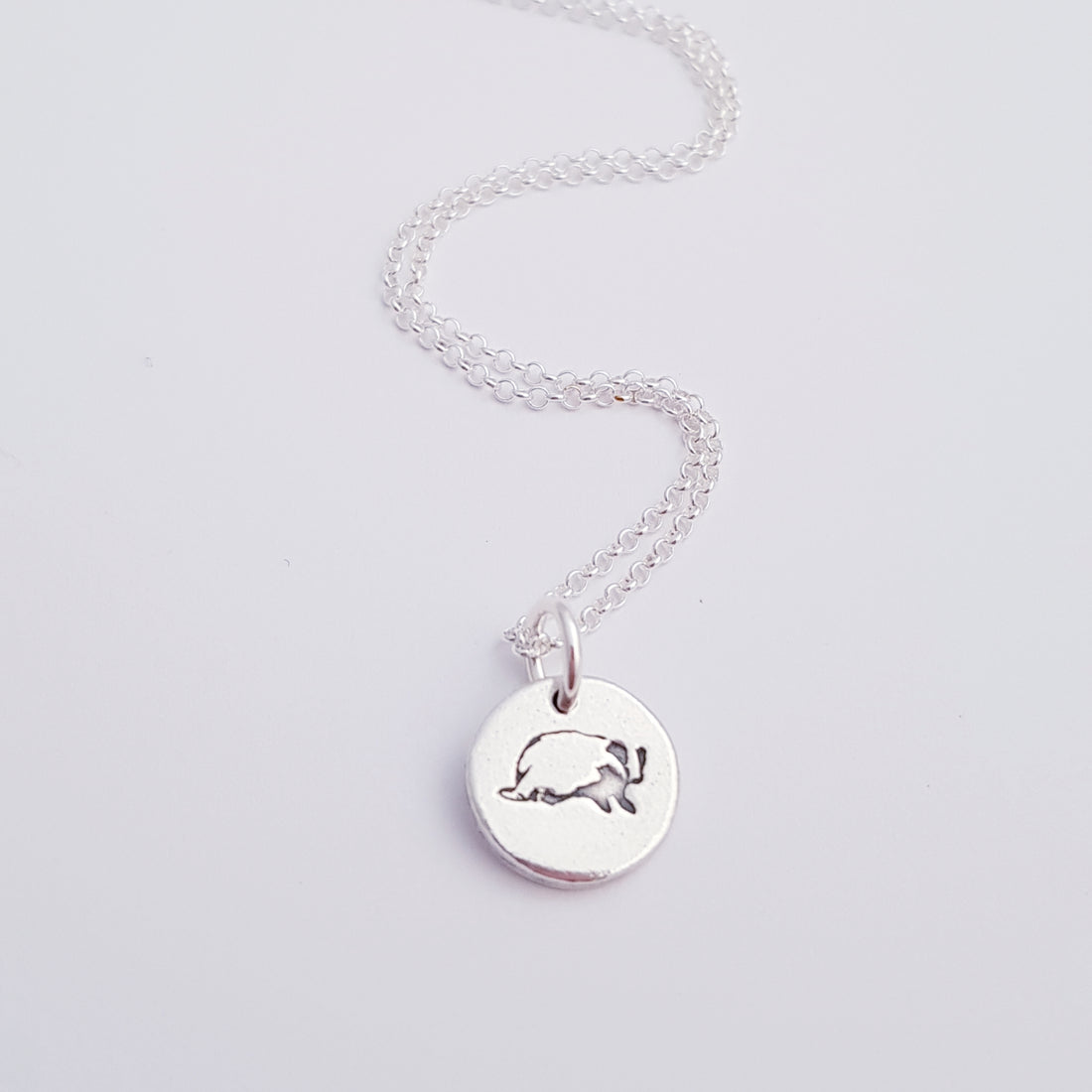 Sterling Silver Tiny 1cm Badger Pendant Necklace – Flutterbuyzstudio
