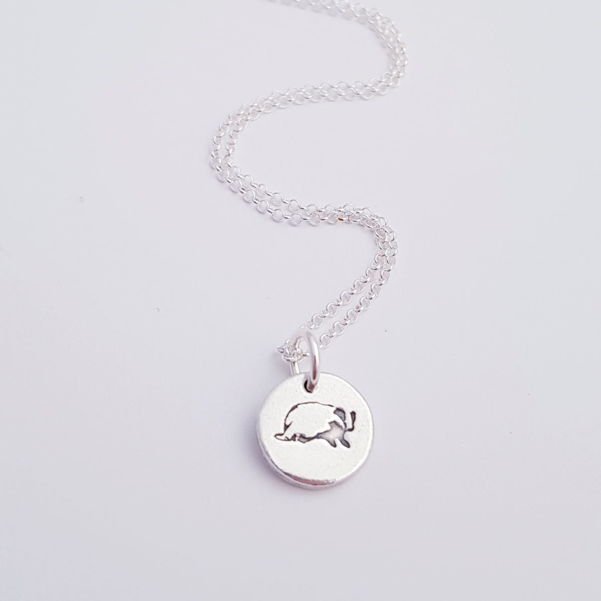 Sterling Silver Tiny 1cm Badger Pendant Necklace – Flutterbuyzstudio